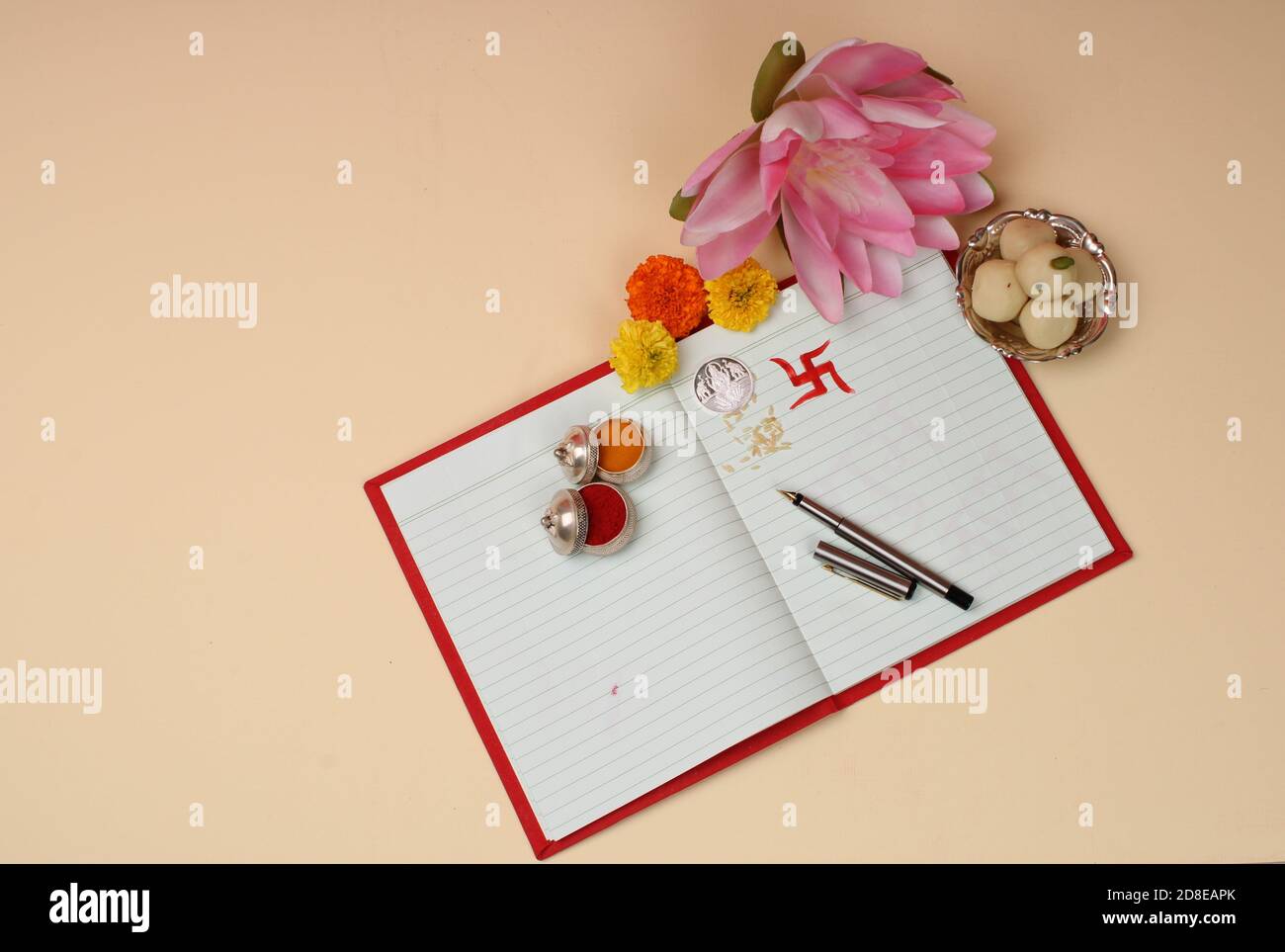 Red accounting note book / bahi khata with copper kalash, sweets ...