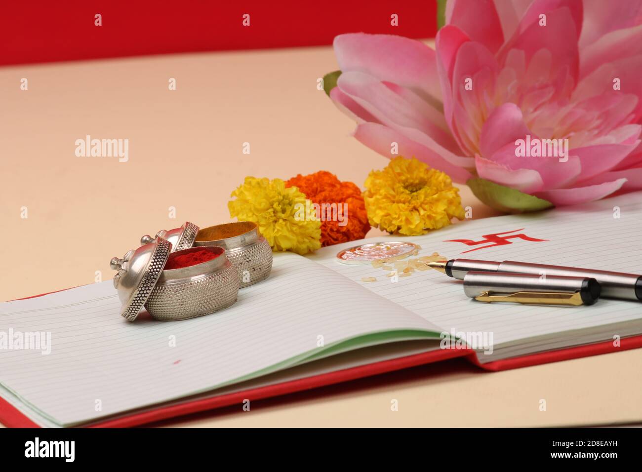 Red accounting note book / bahi khata with copper kalash, sweets ...