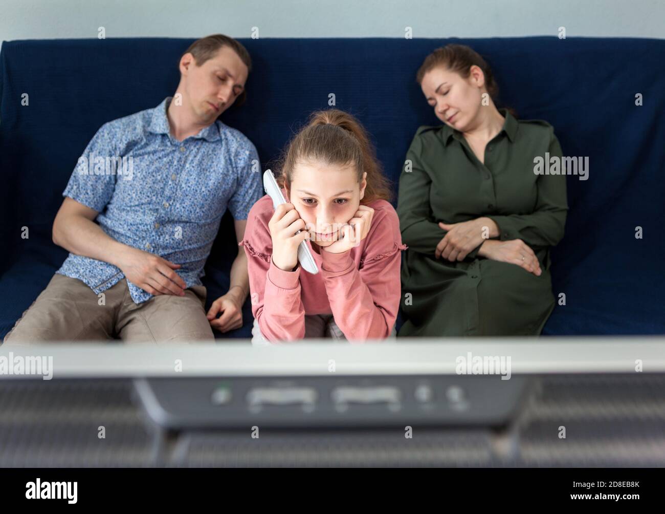 Family Watching Tv Together At Night
