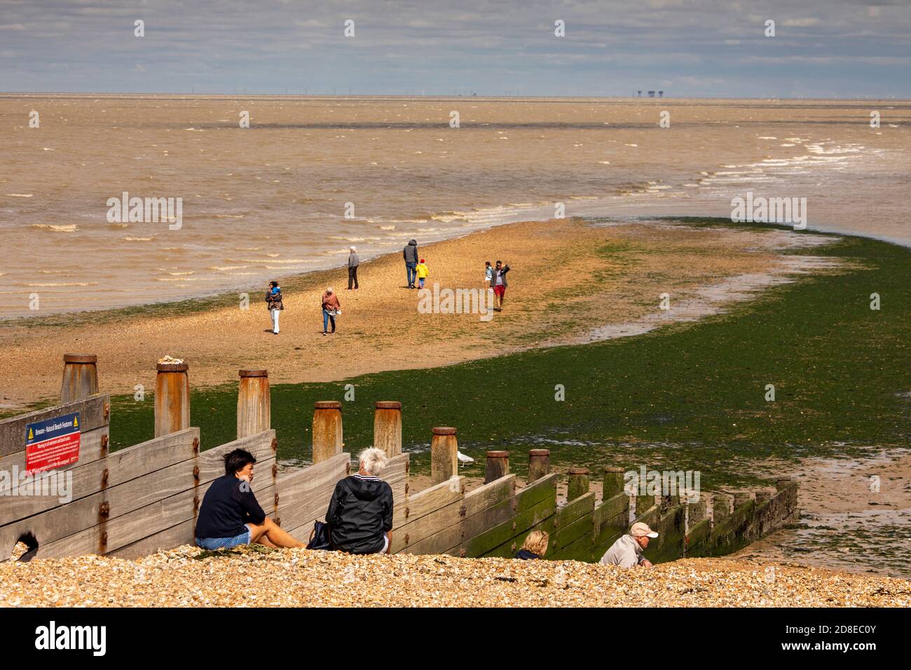 UK, Kent, Whitstable, Tankerton, visitors on the street, natural ...