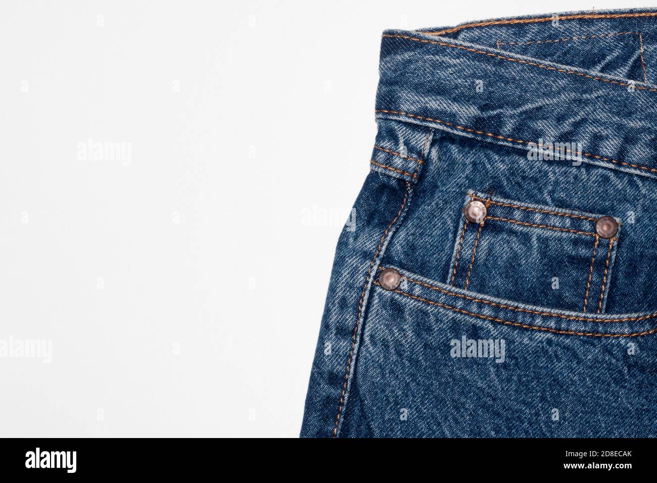 Classic blue jeans front pockets. rough denim texture. jeans on a pure ...