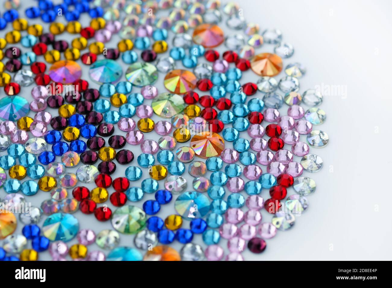 Acrylic stones of different sizes and colors top view. Multi-colored ...