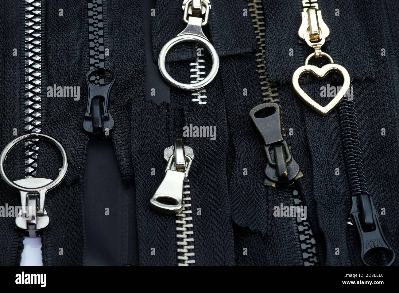 Zipper manufacturing factory hi-res stock photography and images - Alamy