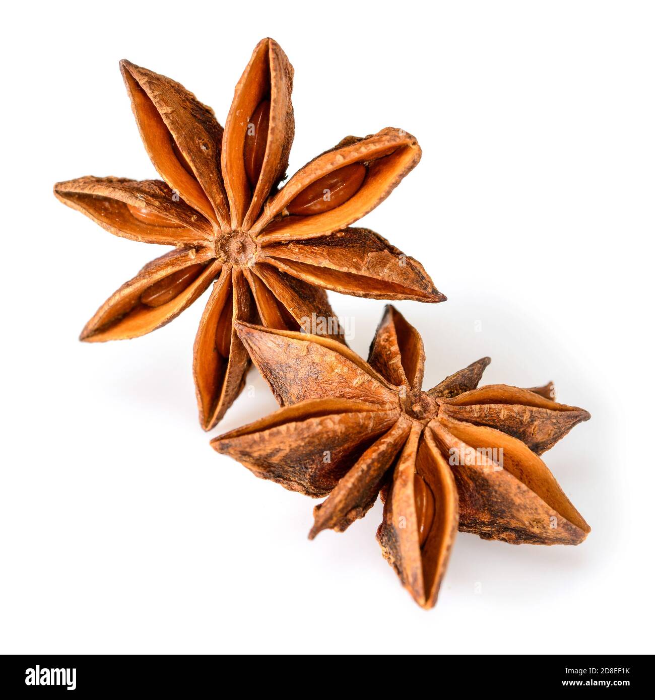 Star anise spice. Two dry star anise fruits isolated on white ...