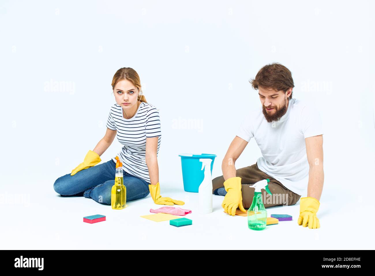 young couple washing floors cleaning supplies cleaning together ...