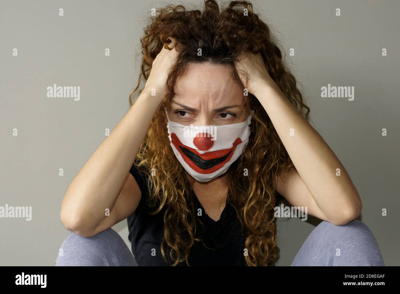 Suspicious woman with protective mask Stock Photo - Alamy