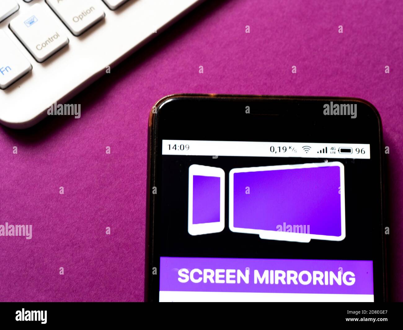 In this photo illustration a Screen Mirroring logo is seen displayed on ...
