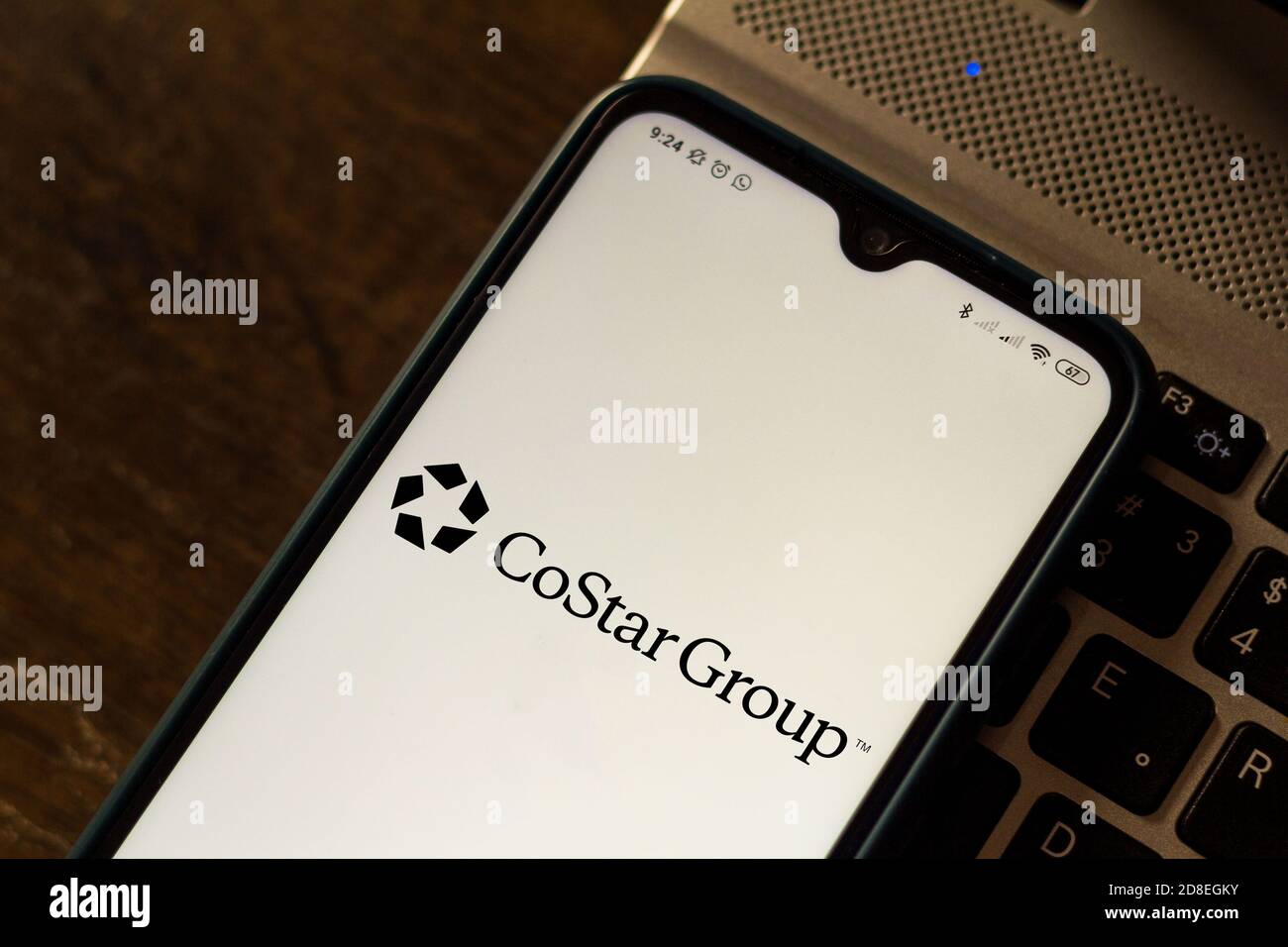 In this photo illustration the CoStar Group logo seen displayed on a ...