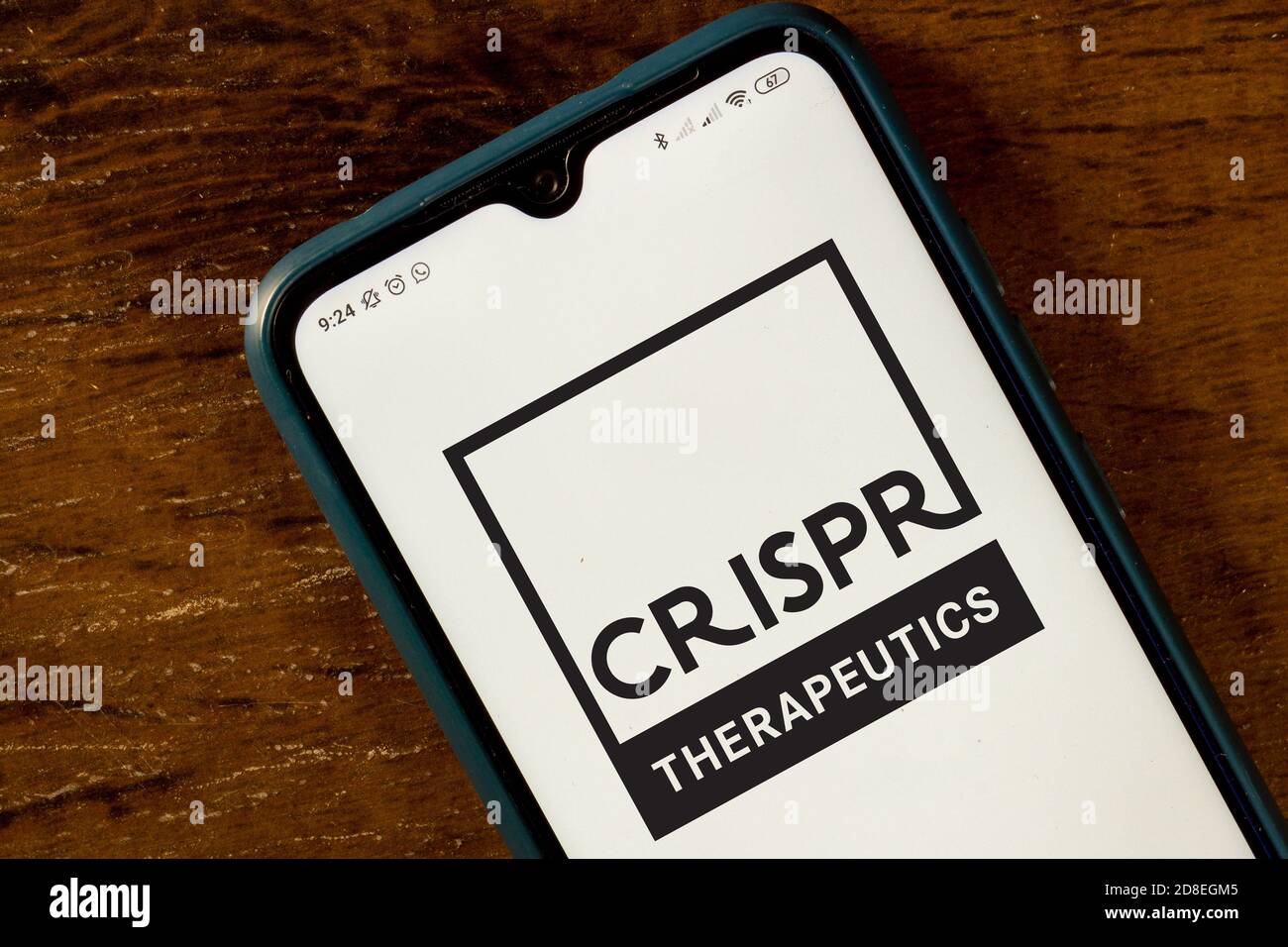In this photo illustration the CRISPR Therapeutics logo seen displayed ...