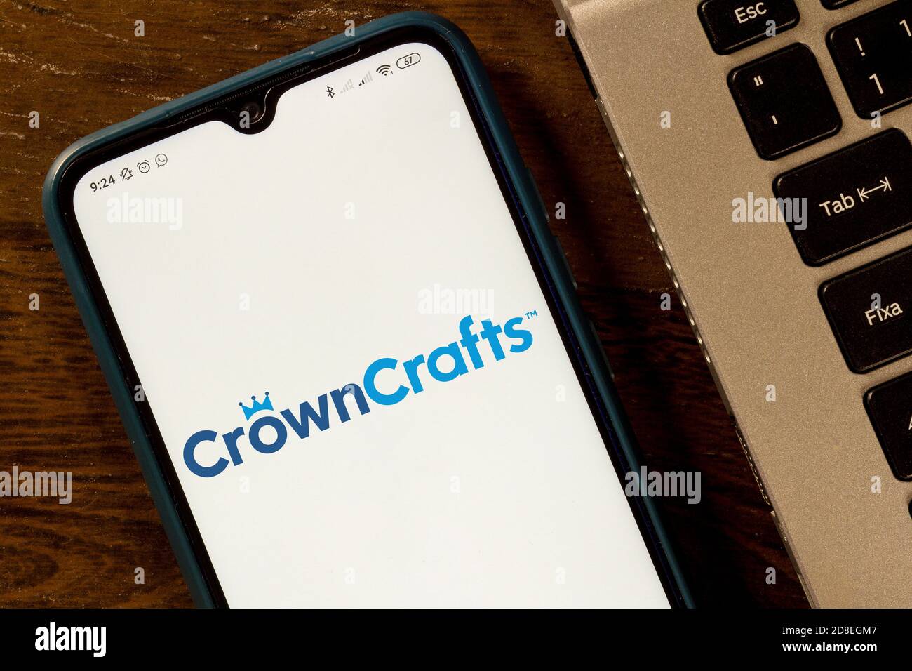 In this photo illustration the Crown Crafts logo seen displayed on a ...