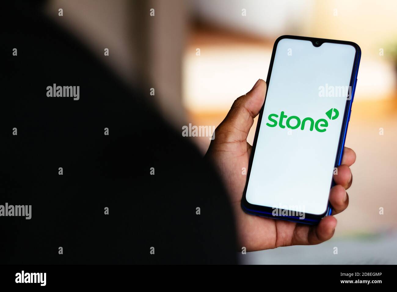 In this photo illustration the Stone Pagamentos logo seen displayed on ...
