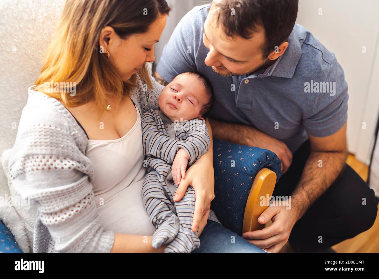 Asian father hugging baby hi-res stock photography and images - Alamy