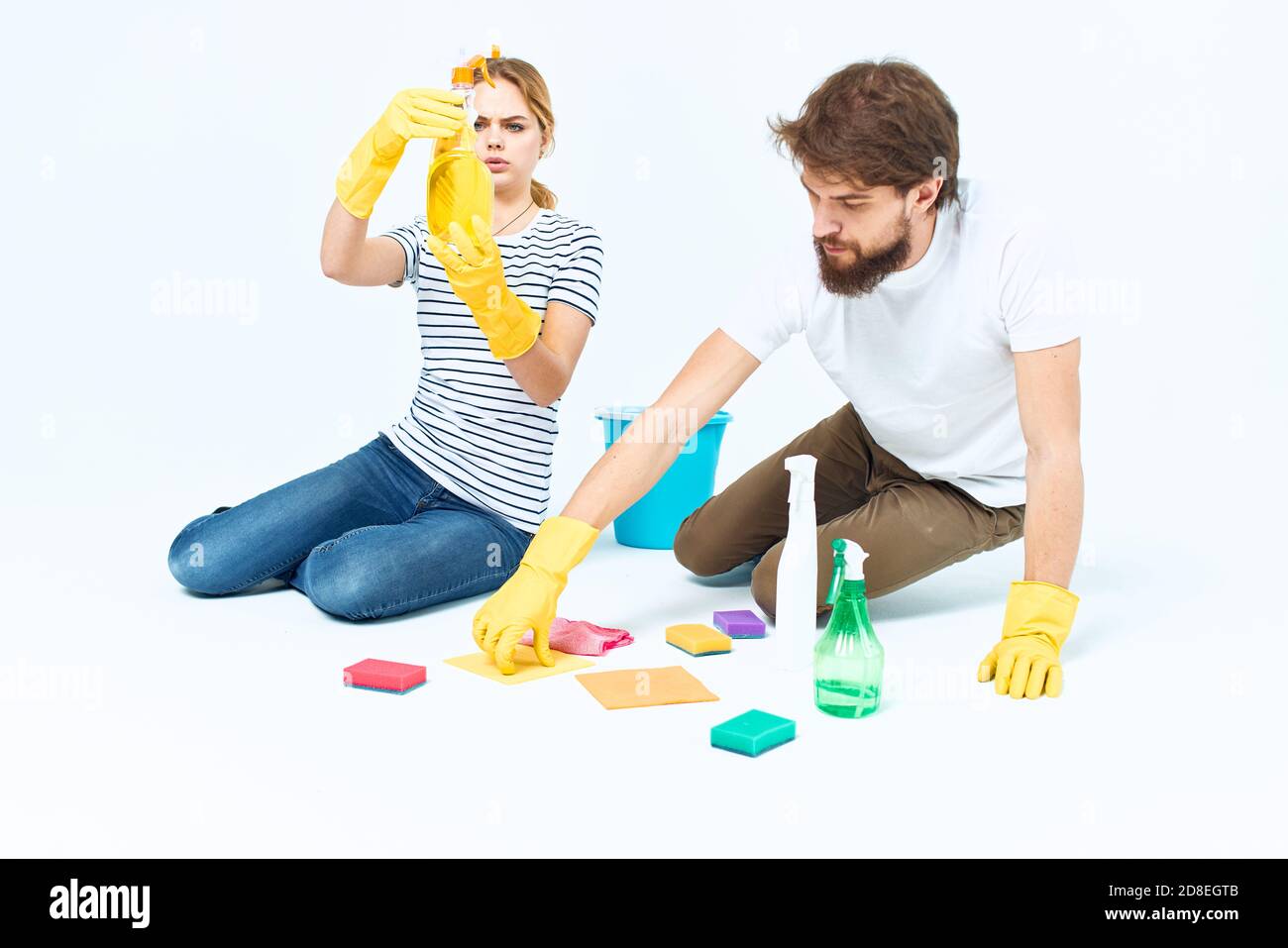 Man and woman detergent lifestyle cleaning teamwork Stock Photo - Alamy