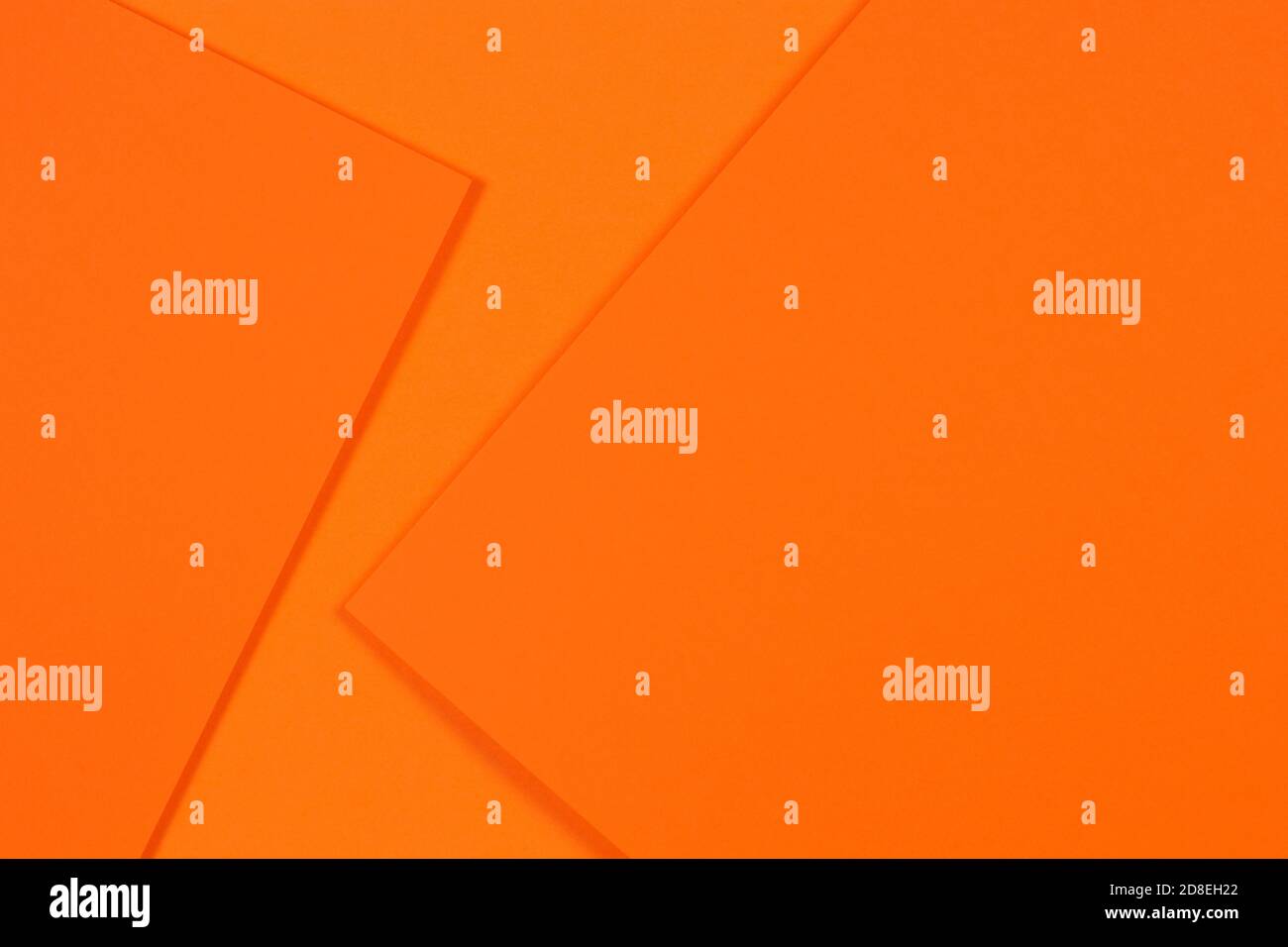 Abstract geometric shape orange color paper background Stock Photo - Alamy