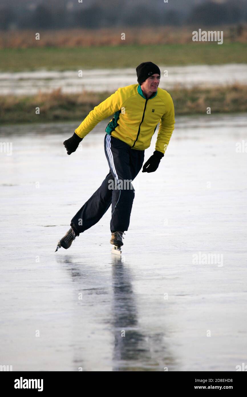 Man ice Skating on the Whittlesey washes nature reserve, Whittlesey ...