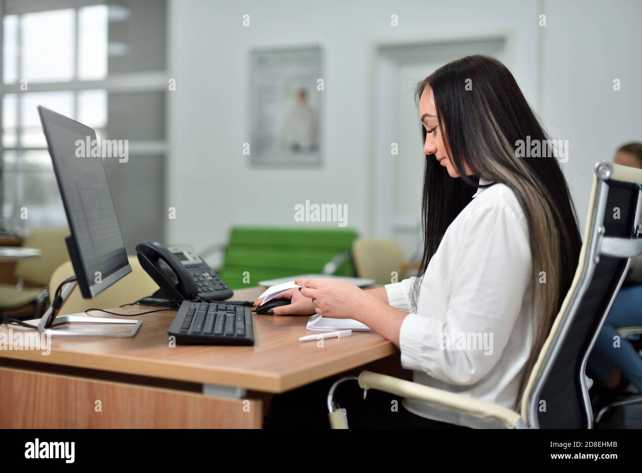 Young woman manager working at her workplace in the office, Caucasian ...