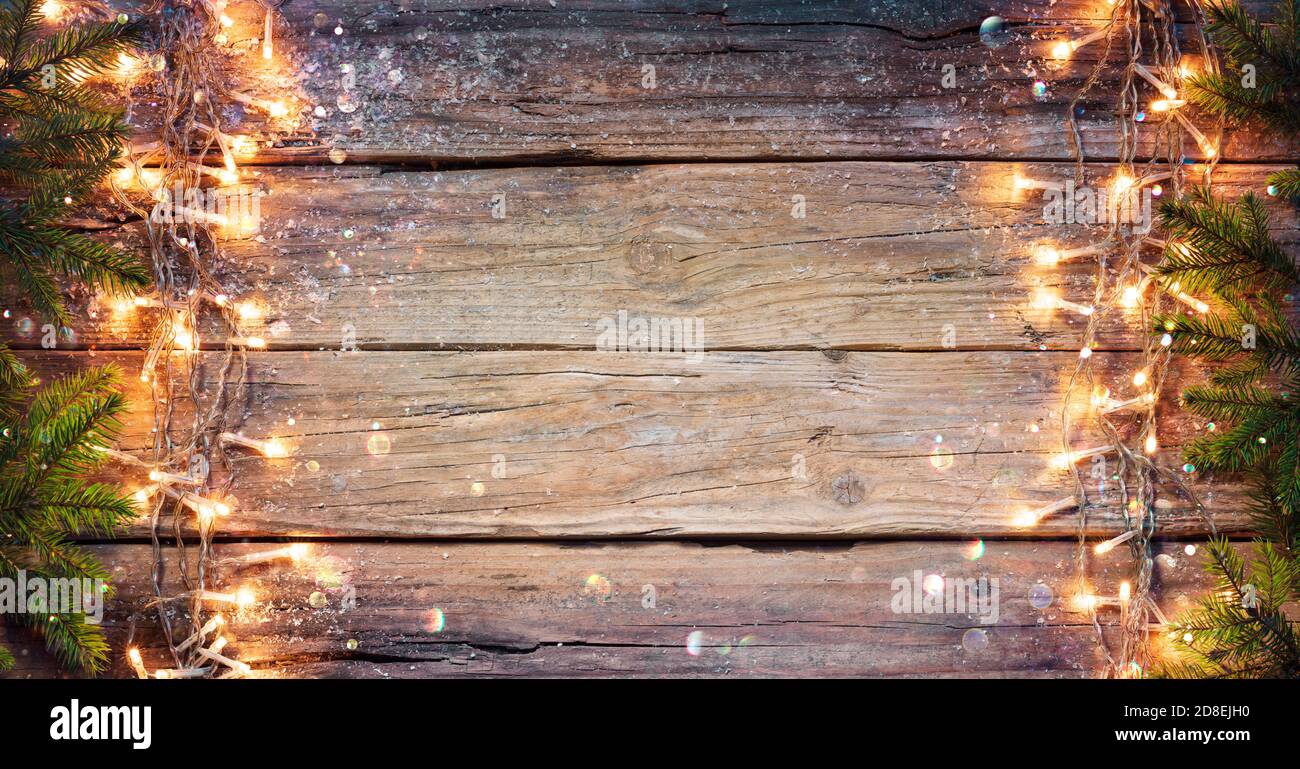 Rustic Christmas Border - Fir Branches And String Light On Old Wooden ...