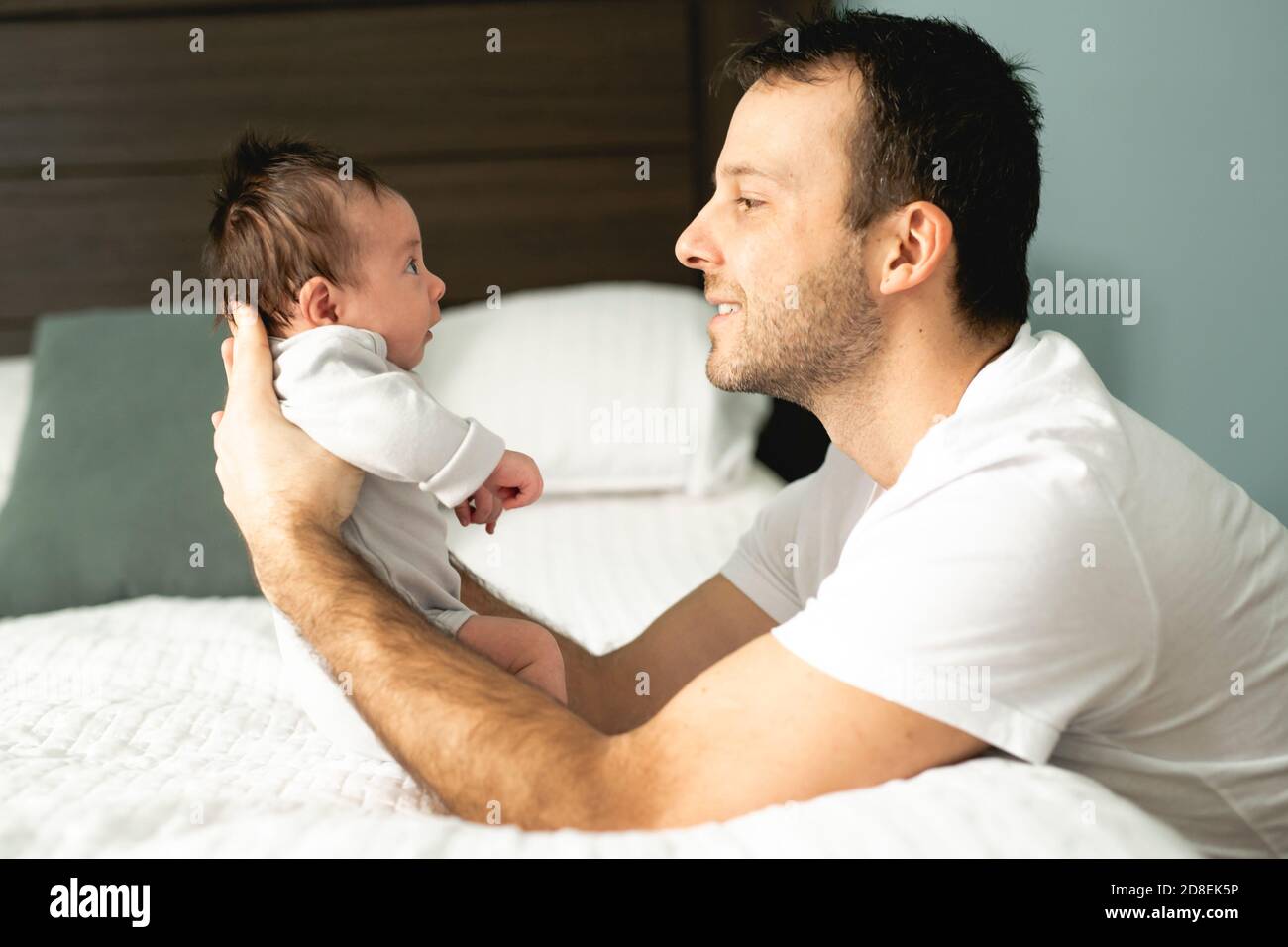 Baby hand boy house hug hi-res stock photography and images - Alamy