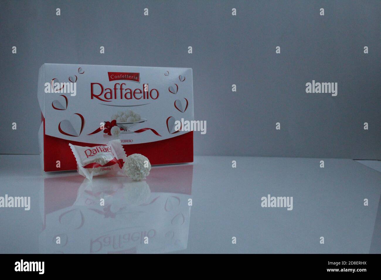 Raffaello's candy and gift box stands on a white gray light background ...