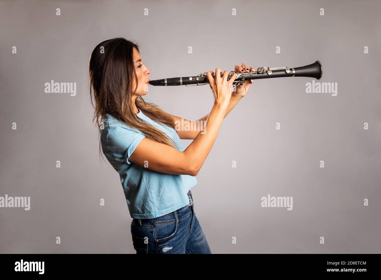 Woman with clarinet hi-res stock photography and images - Alamy