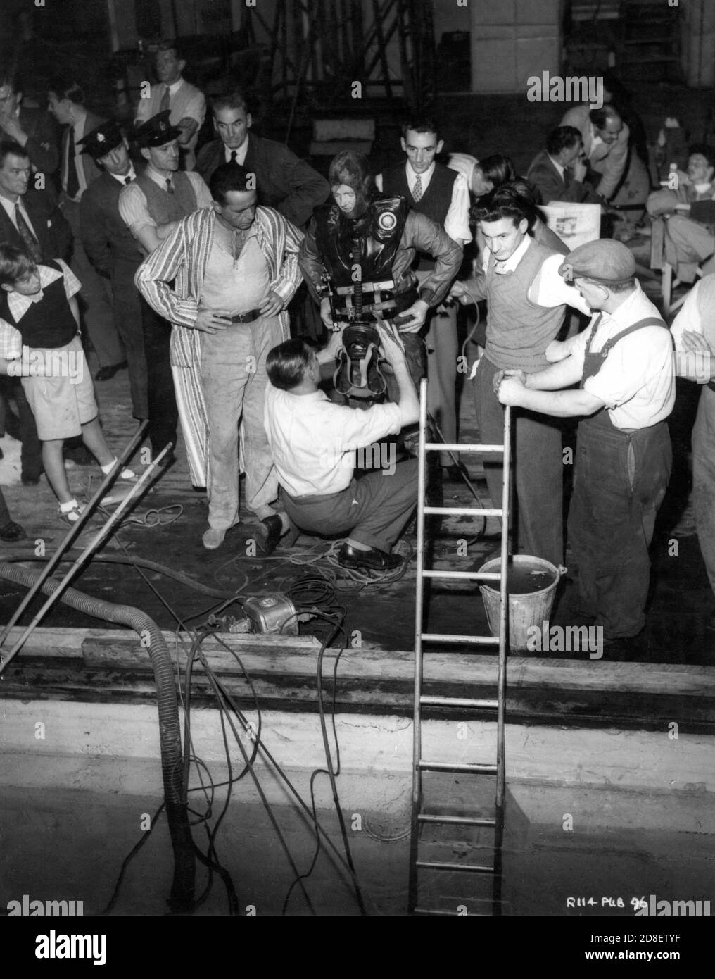 HUMPHREY BOGART and Film Crew ( including KATHARINE HEPBURN sitting at ...