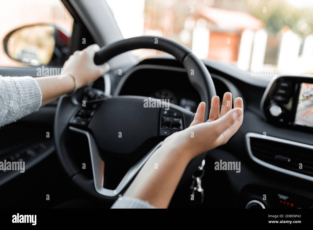 Driver and car concept. Cropped photo of no face female model Stock ...