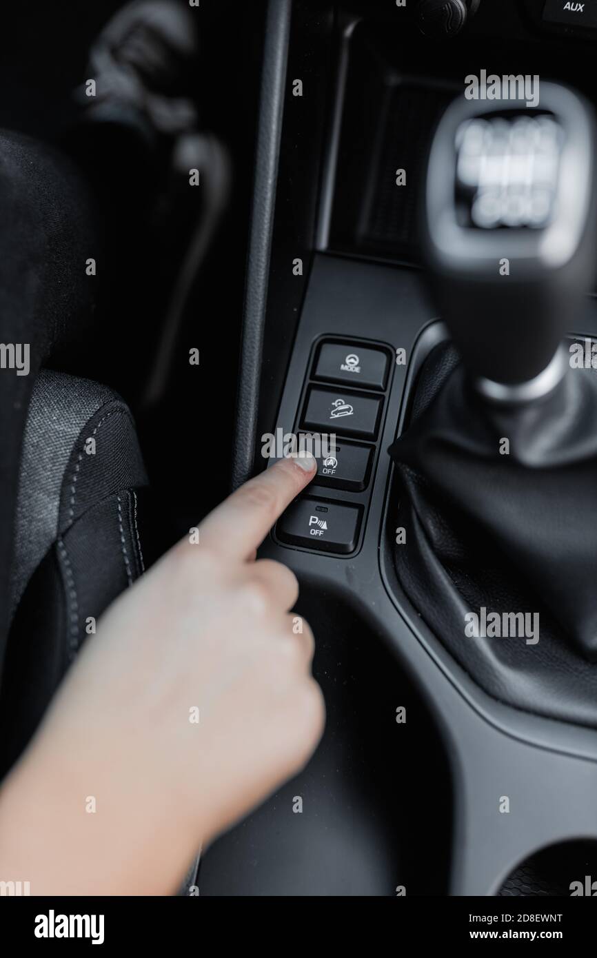 Acceleration system of a car with woman's hand Stock Photo - Alamy