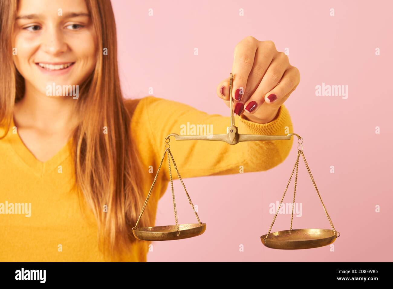 Female hand holding scale justice hi-res stock photography and images ...