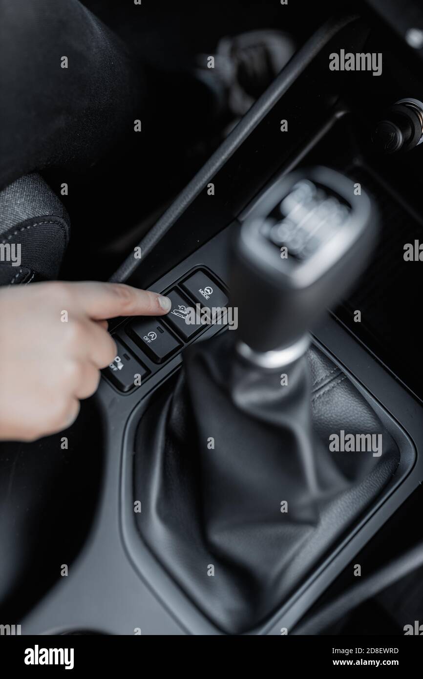 Acceleration system of a car with woman's hand Stock Photo - Alamy