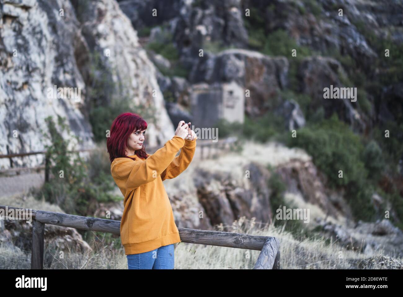Handsome woman in red sweater hi-res stock photography and images - Alamy