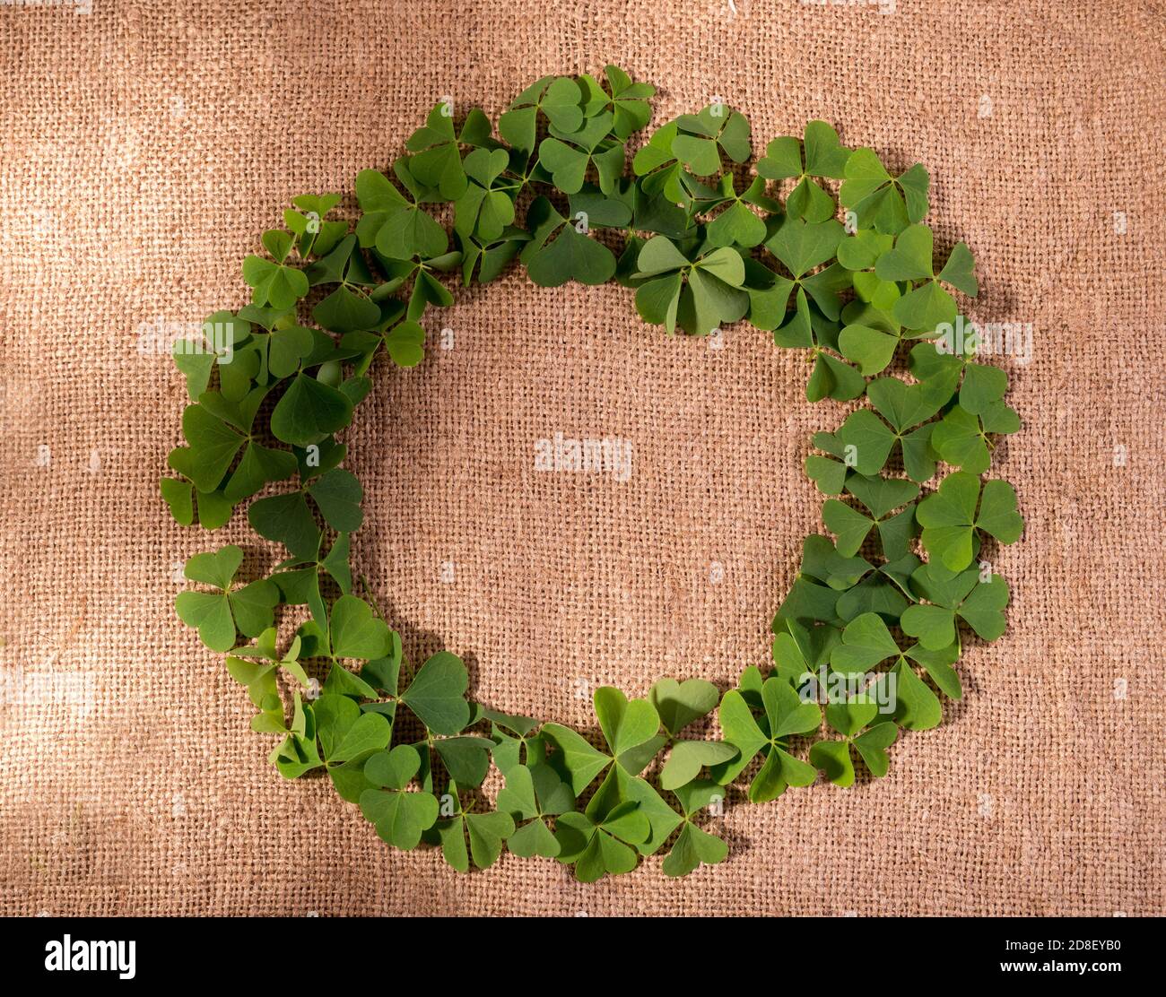 Happy Saint Patrick's Day background with a round frame made of green ...