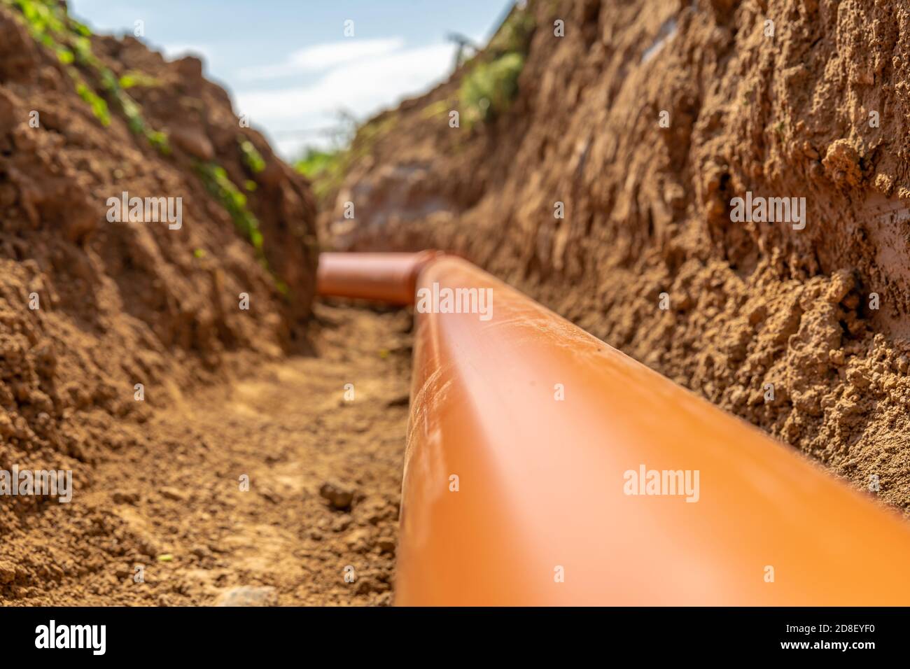 Plastic pipes in the ground during the construction of a building ...
