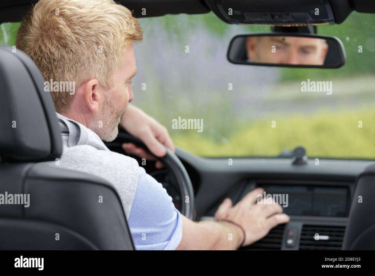 Man using radio in car hi-res stock photography and images - Alamy