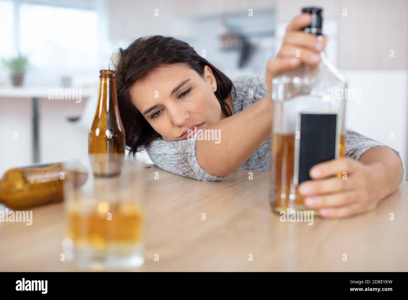Woman slumped table hi-res stock photography and images - Alamy