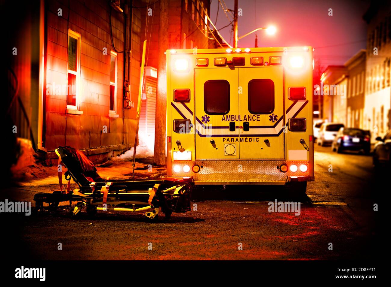 An ambulance car parked on the side street at night Stock Photo - Alamy