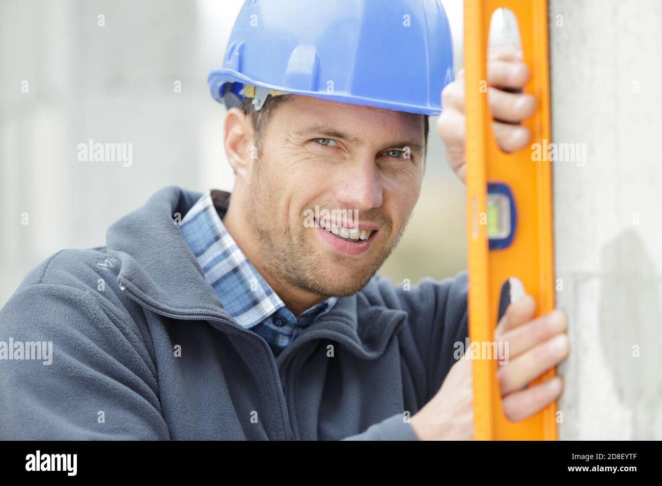 man with professional level tool Stock Photo - Alamy