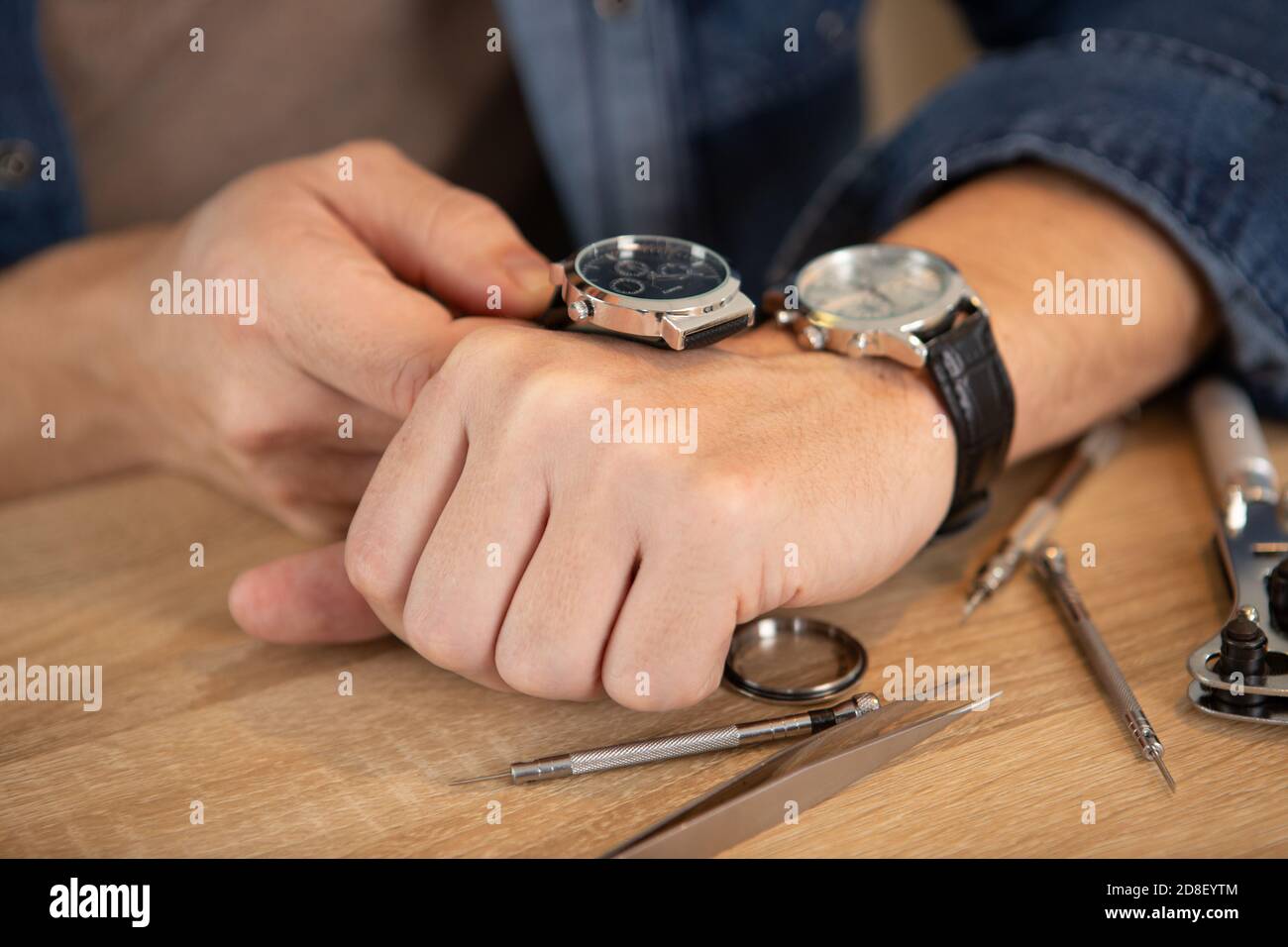 senior watchmaker repairing an old pocket watch Stock Photo - Alamy
