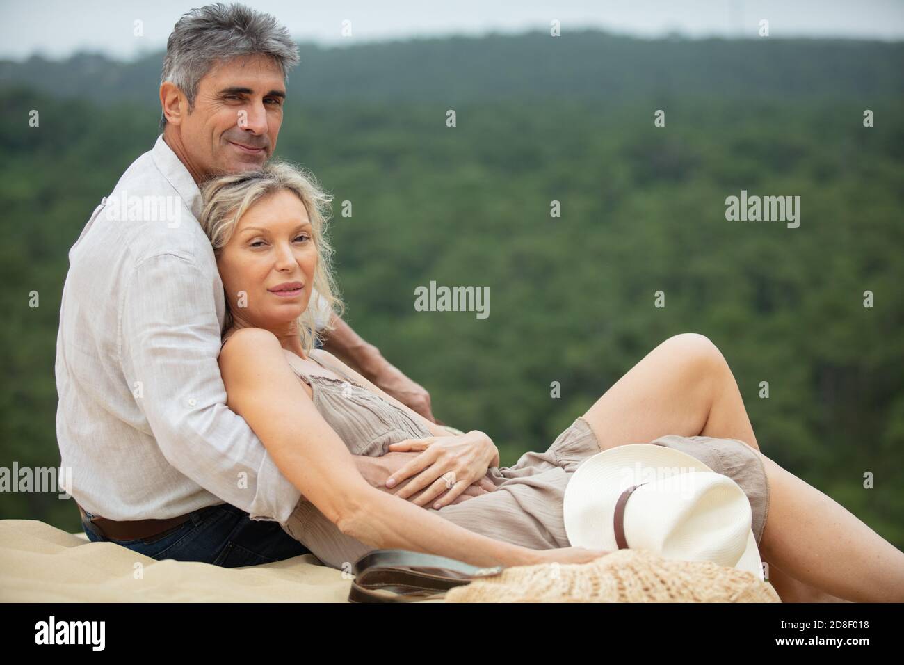 sultry couple on sand dune Stock Photo - Alamy