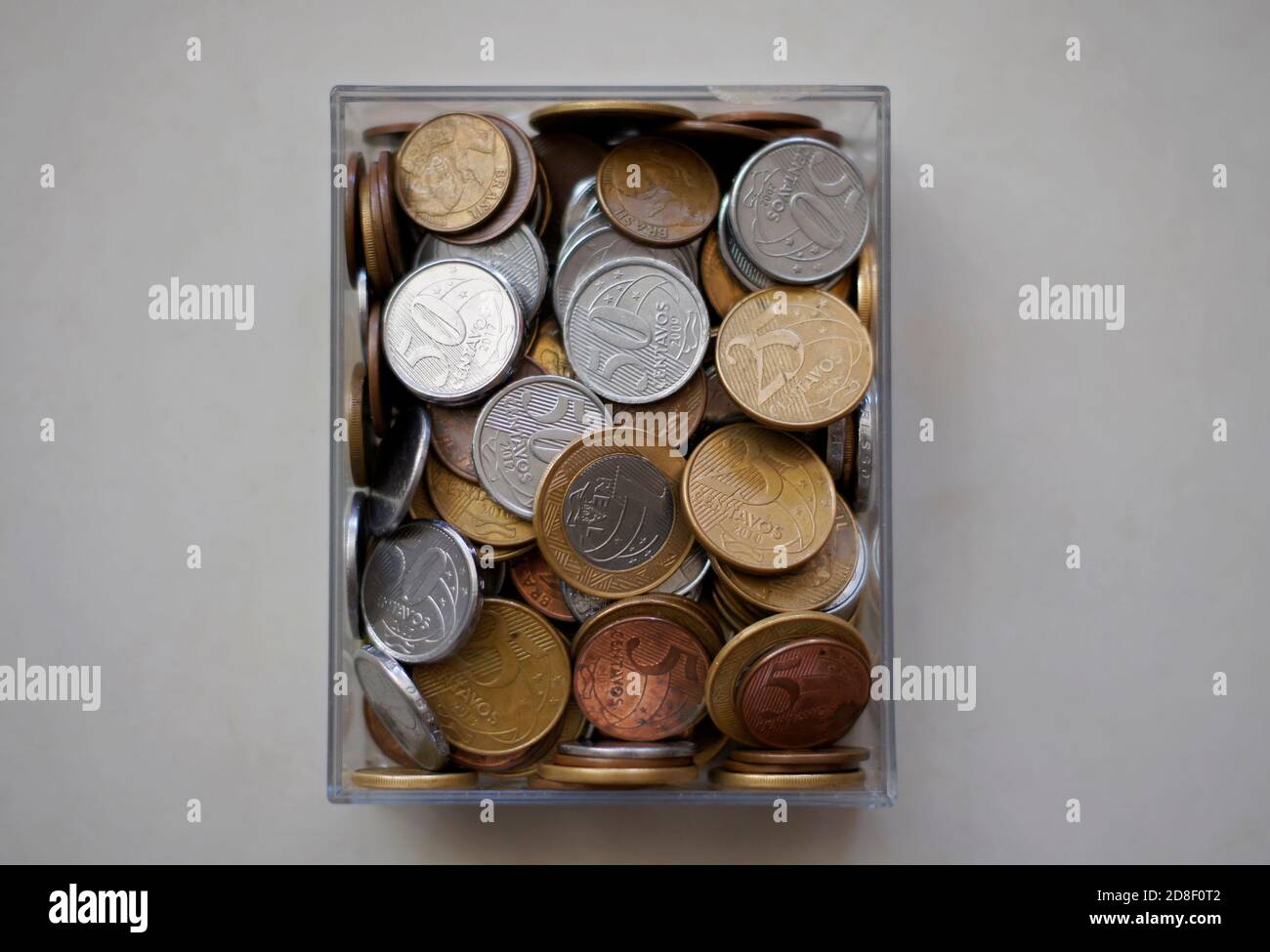 Brazilian real coins in an acrylic box Stock Photo - Alamy