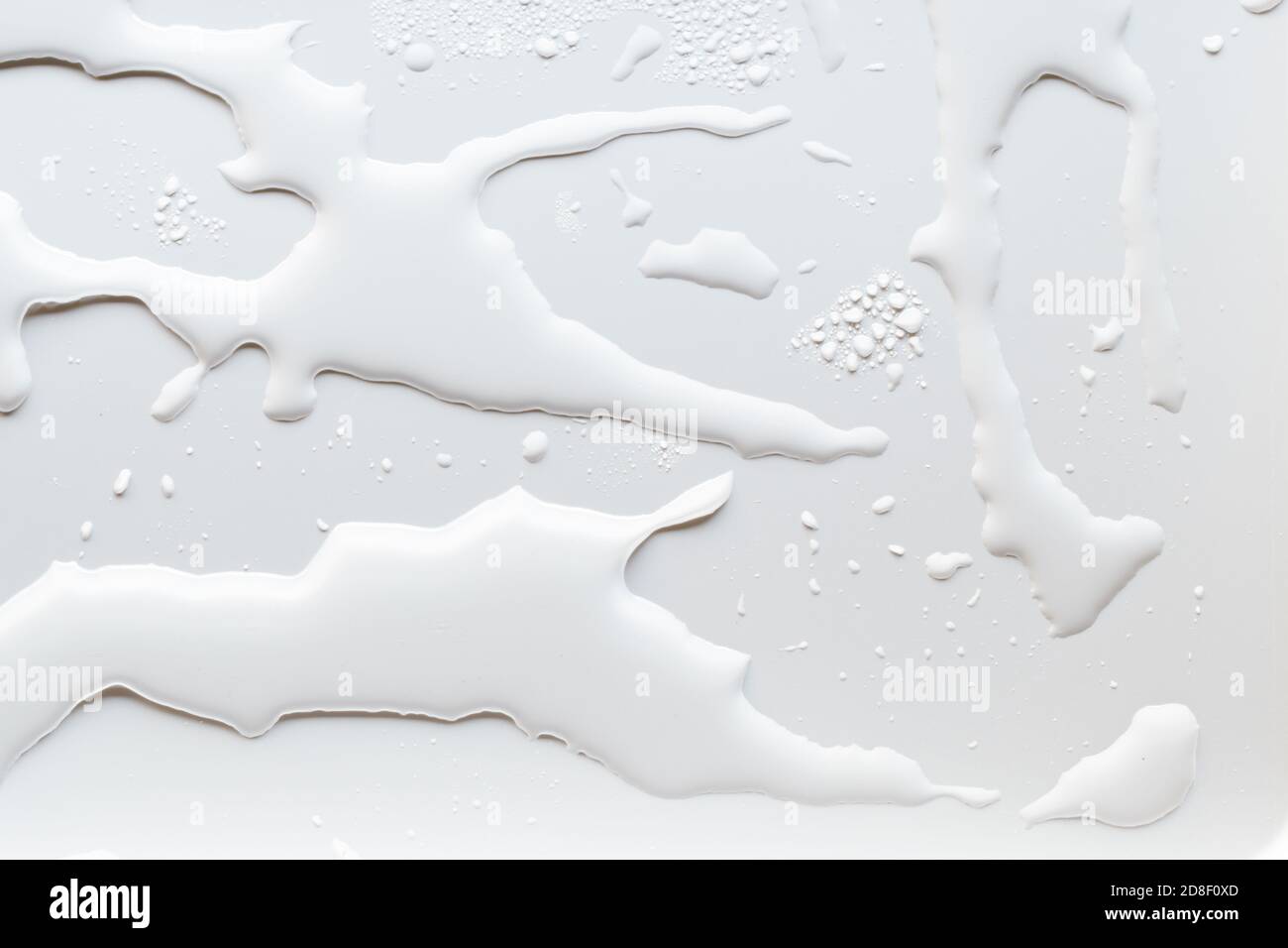 White drops water and milk Stock Photo - Alamy
