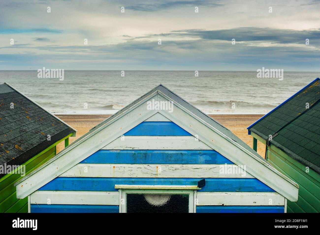 Seaside Changing Hut roofs on a winder's day Stock Photo - Alamy