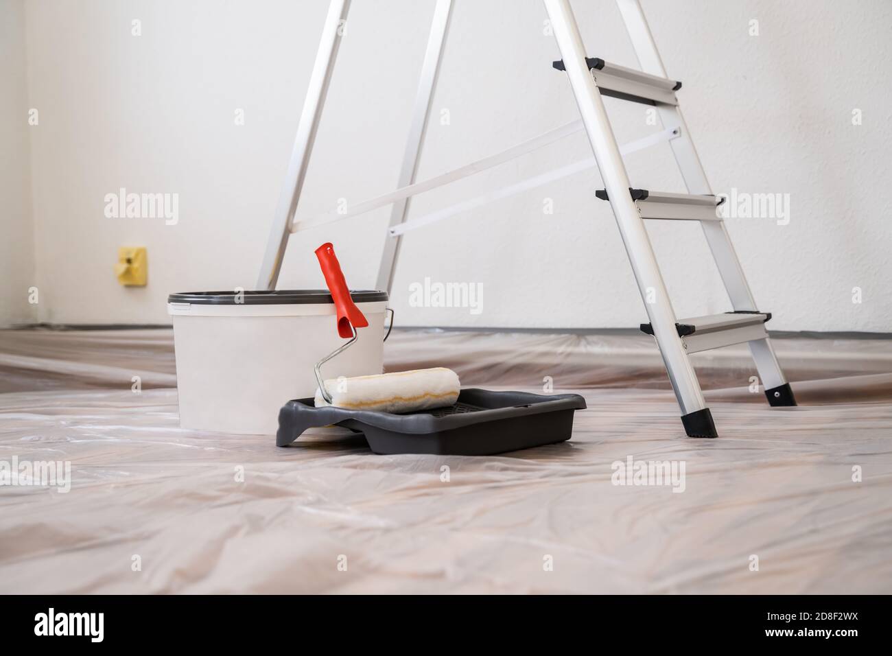 House Wall Paint Inside. Maintenance Painting Service Stock Photo - Alamy