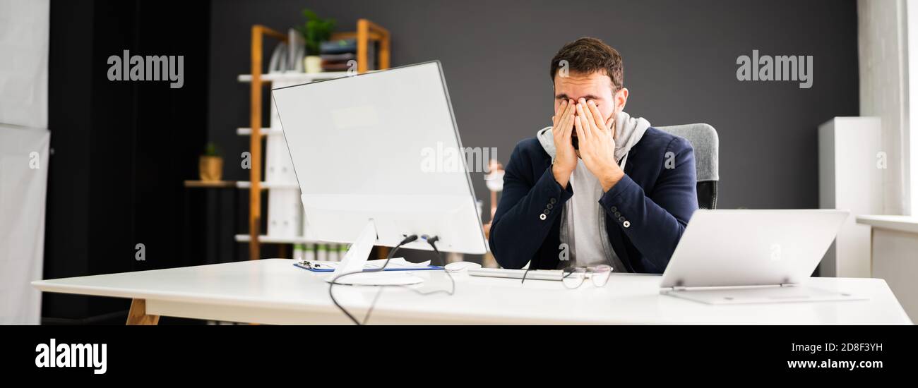 Man With Migraine From Computer Work. Bored And Stressed Sad Stock ...