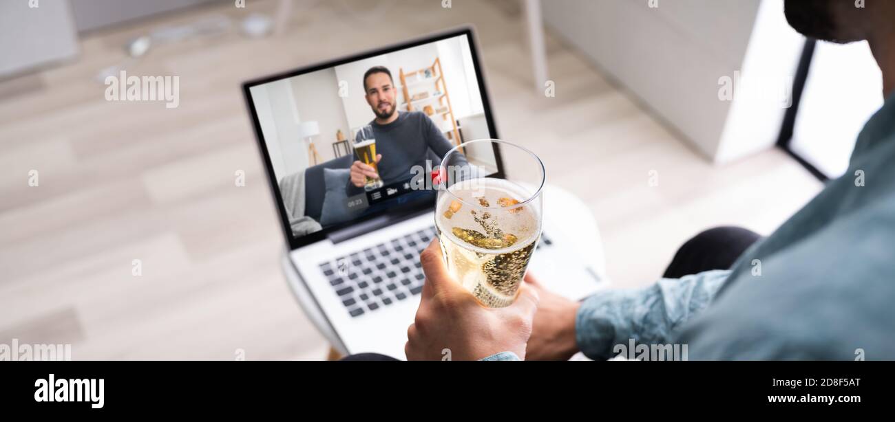 Online Virtual Beer Drinking Party On Laptop Stock Photo - Alamy