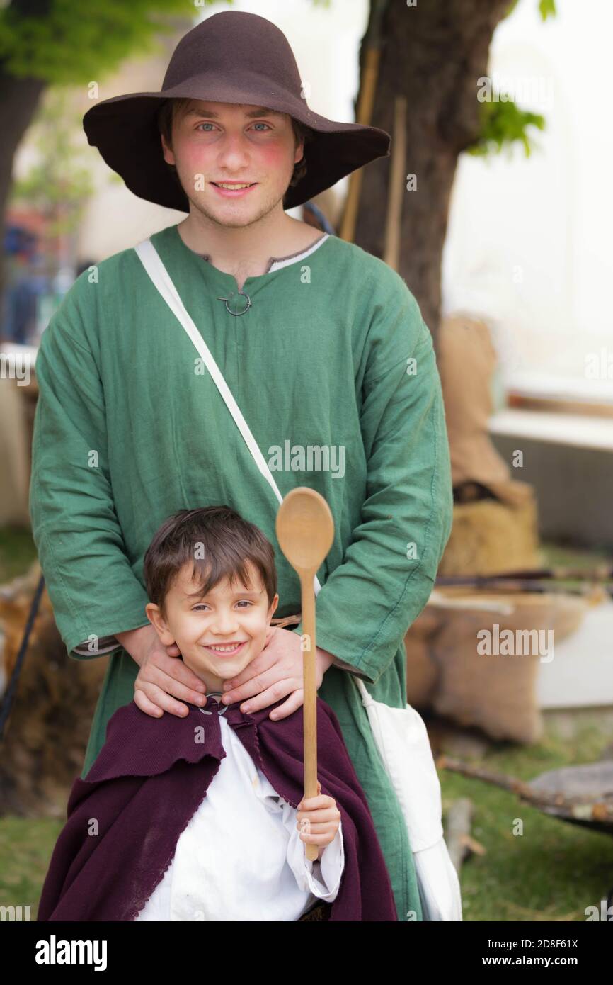 A medieval farmer with his son Stock Photo - Alamy