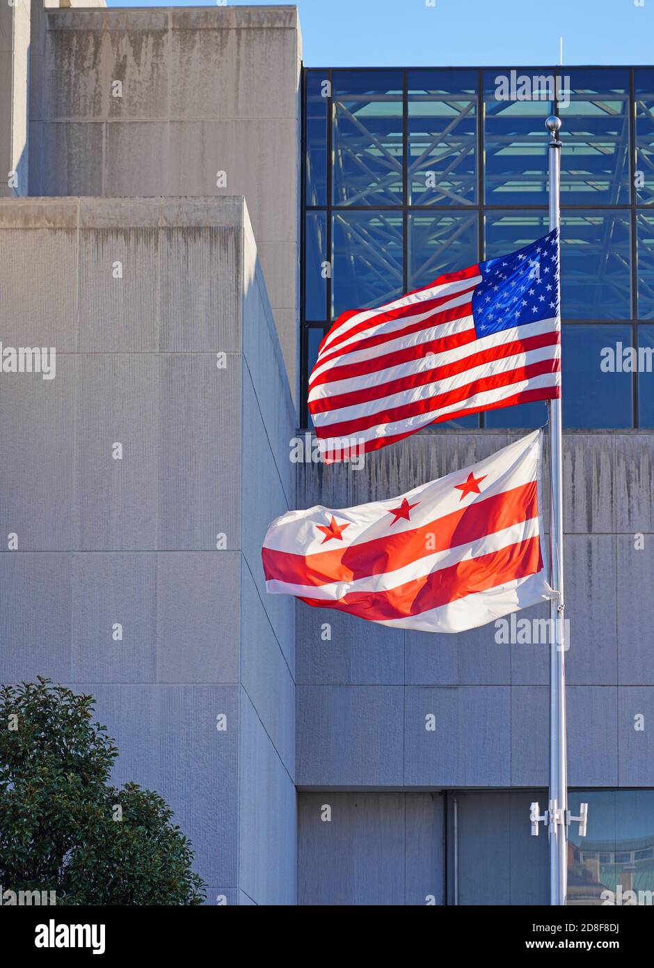 Flags of Washington DC and the United States floating side by side ...