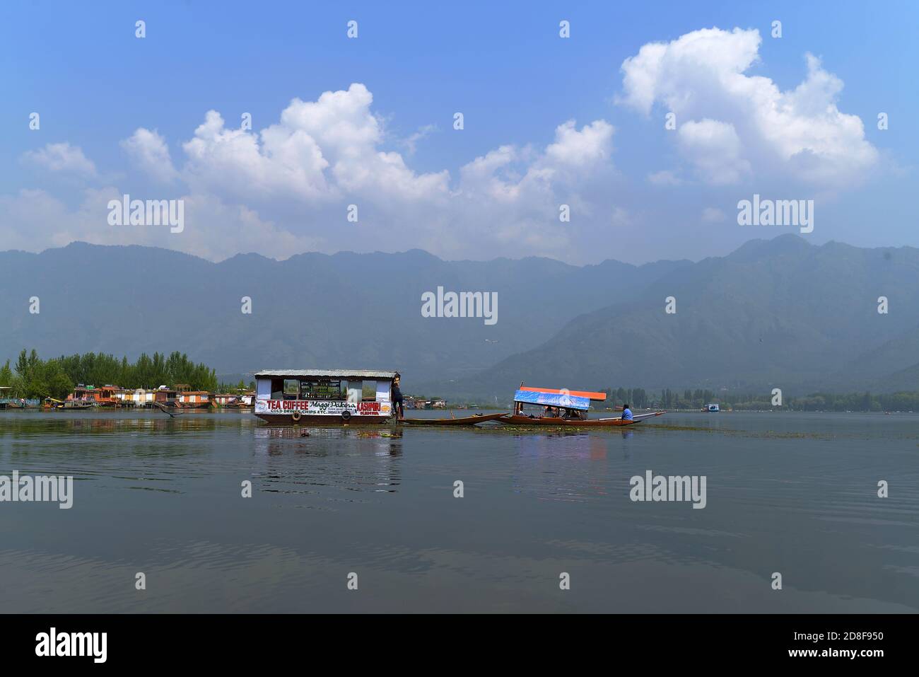 A mobile tea-house on a converted shikar on the Dal Lake in Srinagar ...