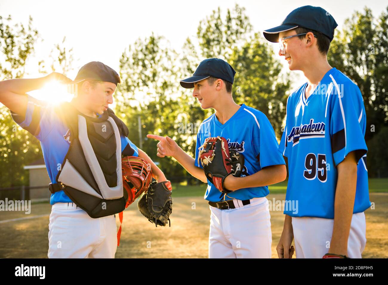 Group of baseball players standing together on the playground Stock ...