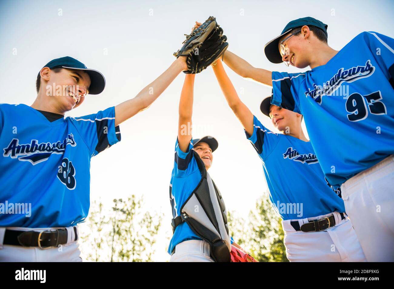 Group of baseball players standing together on the playground Stock ...