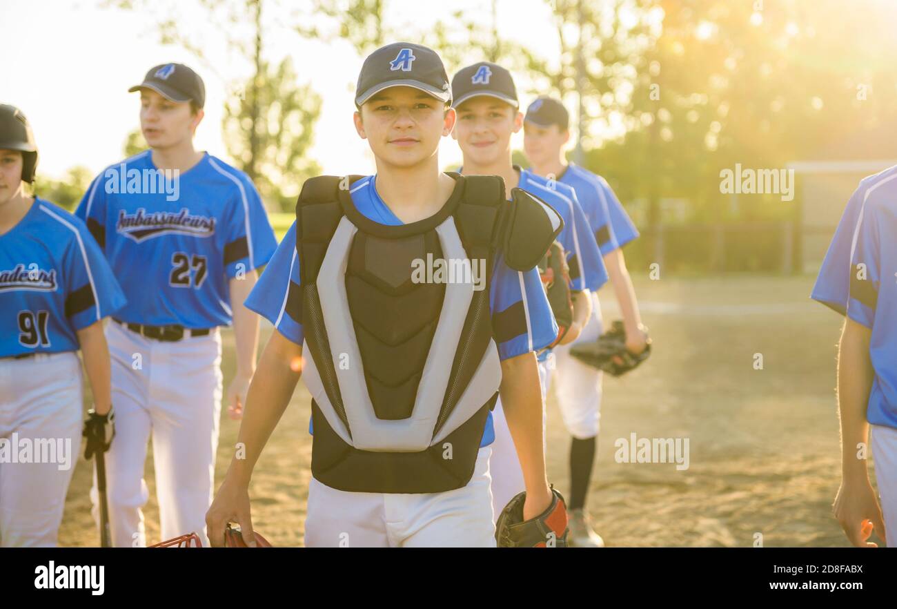 Group of baseball players standing together on the playground Stock ...
